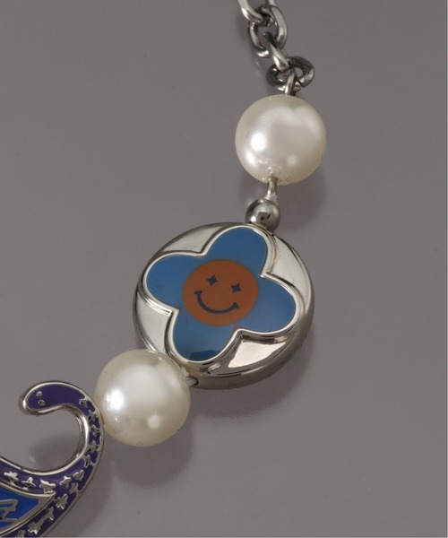 Evae mob（エヴァーモブ）の「【EVAE MOB × SALUTE / エバーモブ× サルーテ】 Cross flower smiley ...