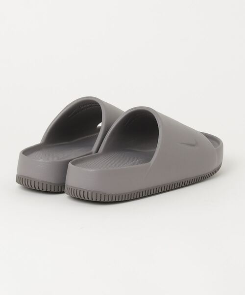 NIKE（ナイキ）の「NIKE CALM SLIDE FD4116-002（サンダル）」 - WEAR