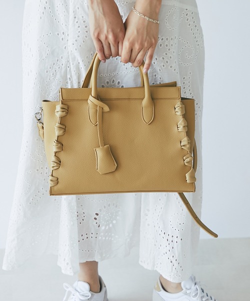 cache cache（カシュ カシュ）の「cache cache(カシュカシュ) リボンかがり2WAYバッグ（ショルダーバッグ）」 - WEAR