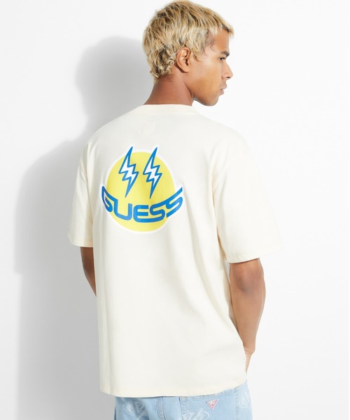 Guess（ゲス）の「GUESS x J BALVIN Guess Smile Tee（Tシャツ/カットソー）」 - WEAR