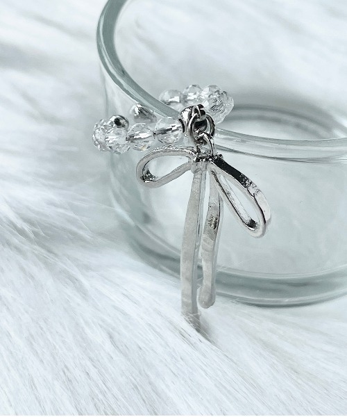 tone（トーン）の「【Tiny gem room】クリスタル リボン イヤーカフ(MA)（イヤーカフ）」 - WEAR